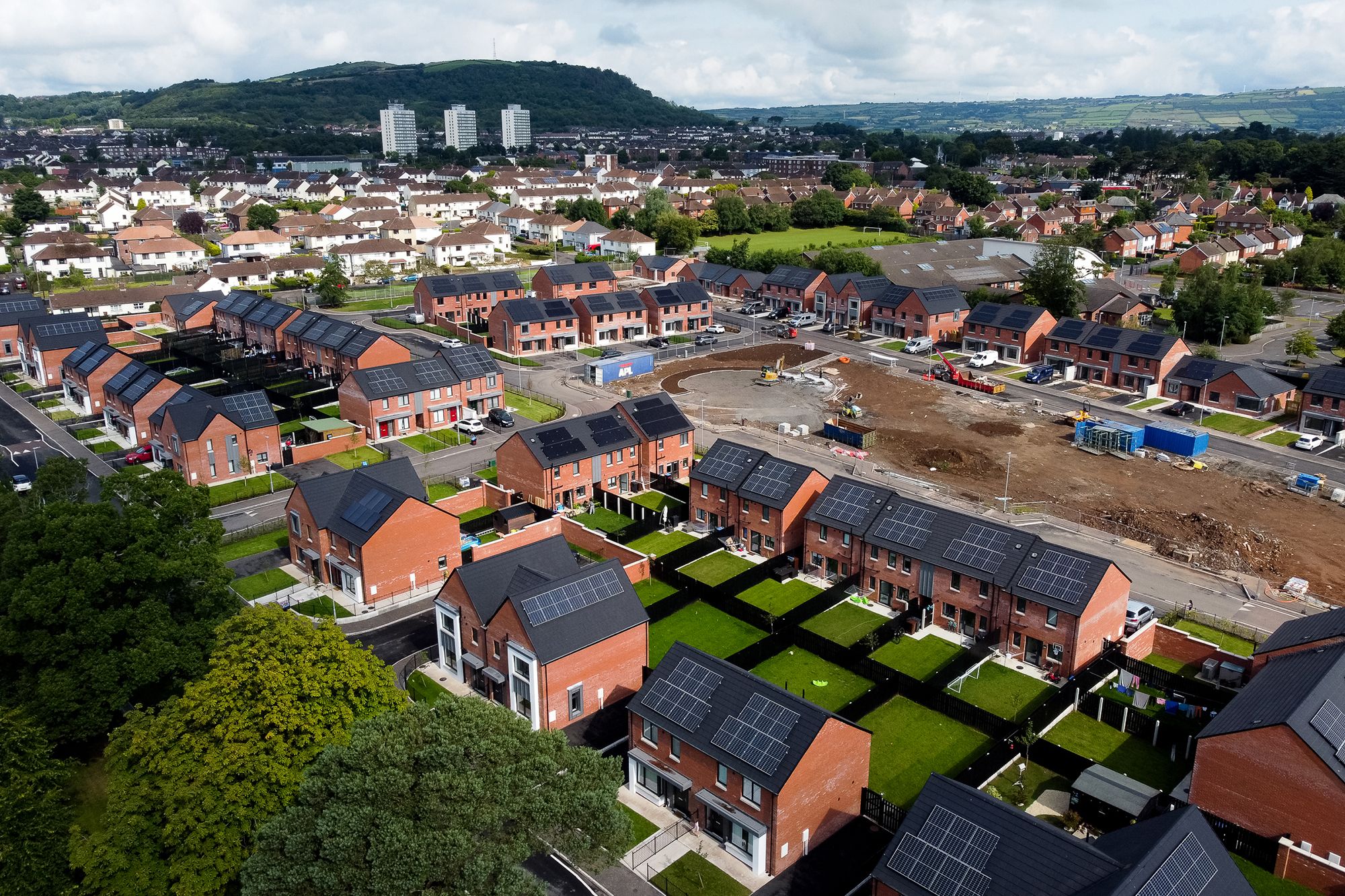 Keys to first 57 homes in North Belfast development handed over to tenants
